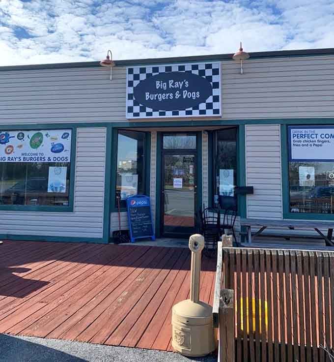 That retro checkered pattern and waterfront deck make Big Ray's look like Happy Days meets modern casual dining perfection.