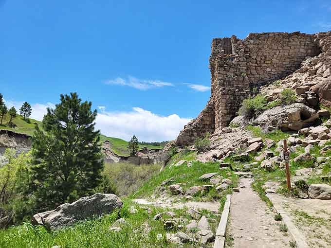 Ancient stone ruins standing against blue sky whisper tales from when your grandparents' grandparents were young folks.