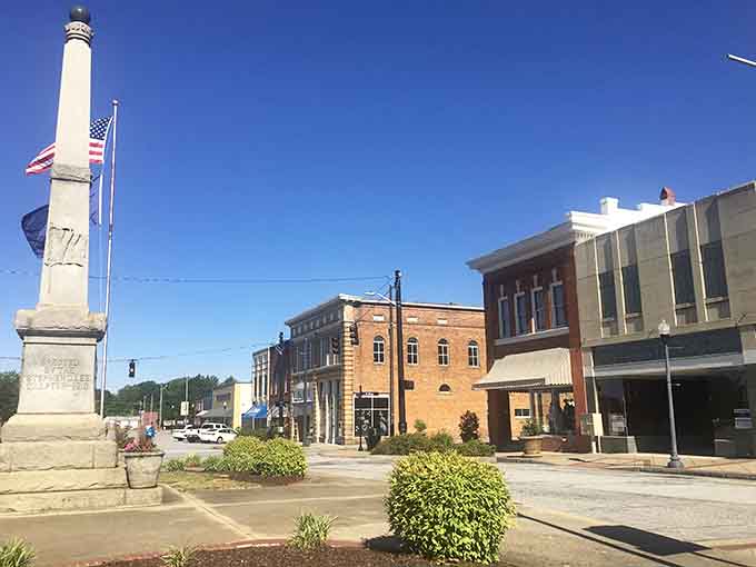Monument standing tall in the town square like a proud grandfather watching over generations of affordable Southern living.