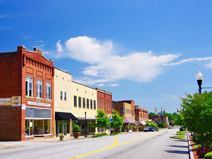 Main Street stretches out under blue skies, inviting you to explore every colorful storefront at your own pace.
