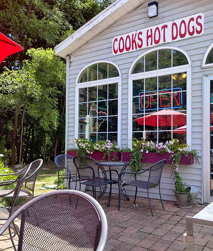 Those arched windows and flower boxes transform a simple hot dog stand into something resembling a charming cottage retreat.