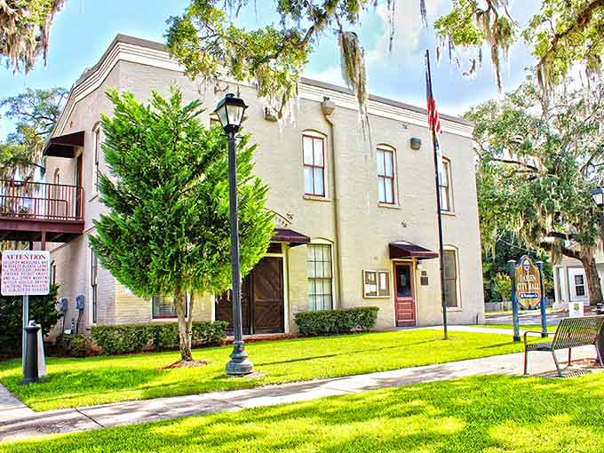 Spanish moss drapes the oaks like nature's curtains framing this historic building where coastal Georgia stories come alive.