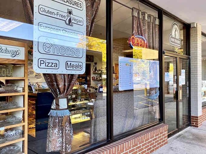 That cheerful storefront window displays gluten-free and vegan options—because everyone deserves to experience chocolate happiness, no exceptions allowed.