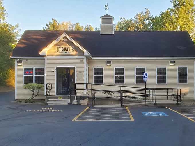 The weathered cupola and modest entrance hint at fried chicken secrets that locals have treasured for decades.