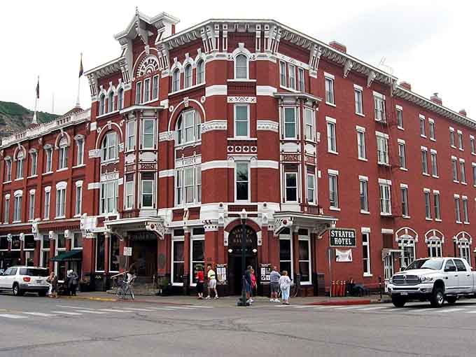 This grand Victorian hotel corner has welcomed travelers with red brick elegance since before your grandparents learned to drive.