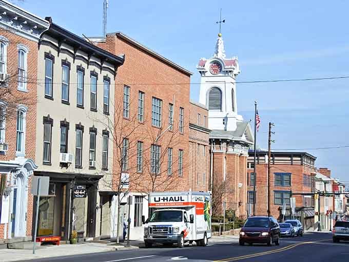 That elegant clock tower stands watch over downtown like a patient grandfather keeping time for generations.