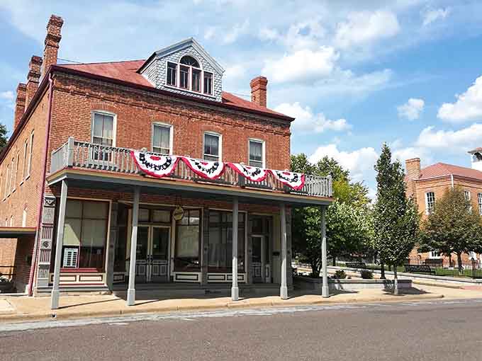 This patriotic building stands proudly as neighbors wave and strangers become friends over shared discoveries and ice cream.
