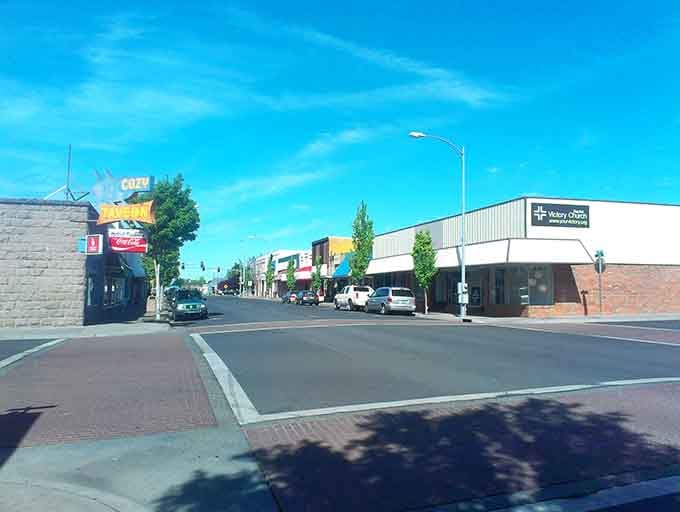 Wide boulevards under endless blue skies offer breathing room that cramped city blocks forgot existed generations ago.