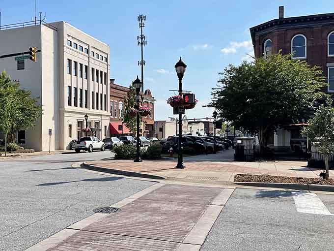 Ornate lampposts and brick pavers show attention to detail that makes walking downtown feel special, not just functional or rushed.