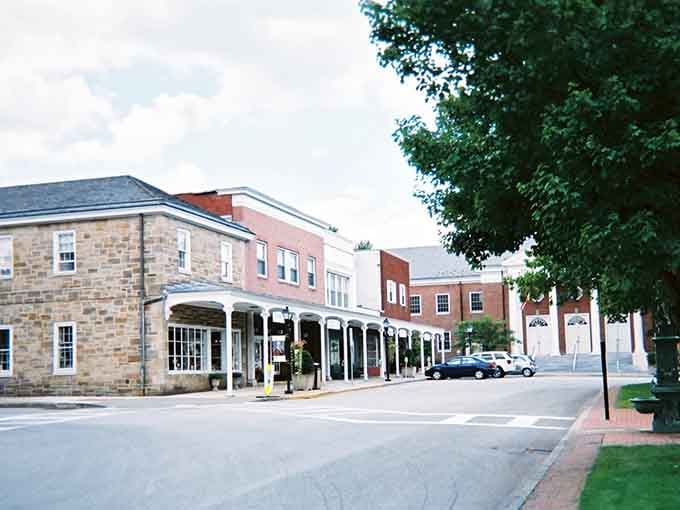 Neat storefronts with covered walkways line the quiet street, offering small-town shopping without the hassle of crowded parking lots or pushy salespeople.
