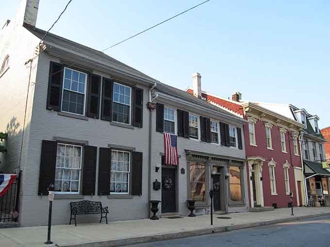 Colonial-era buildings line up like soldiers at attention, their shutters crisp as a freshly ironed Sunday shirt.