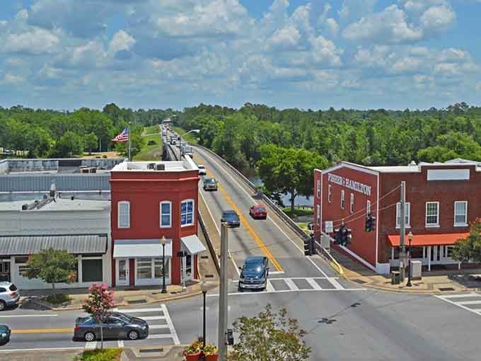 Red brick buildings line the street like old friends, offering that timeless downtown experience without the tourist trap pricing.