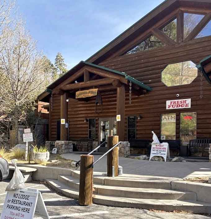 Log cabin construction and mountain air combine perfectly at this alpine hideaway where "fresh fudge" signs never lie about sweetness.