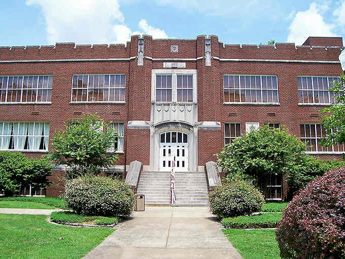 Classic brick architecture meets modern purpose in this beautifully maintained building where education and community intersect seamlessly.