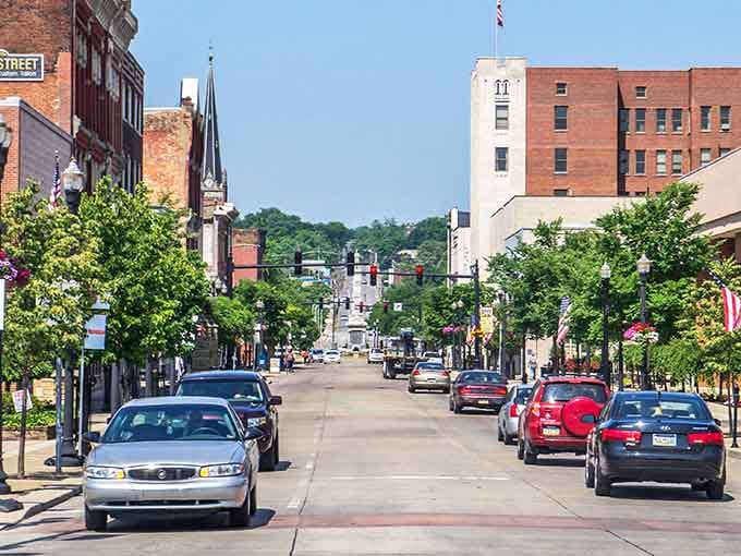 Tree-lined streets lead your eye toward distant hills, framing this charming downtown in nature's own picture frame.