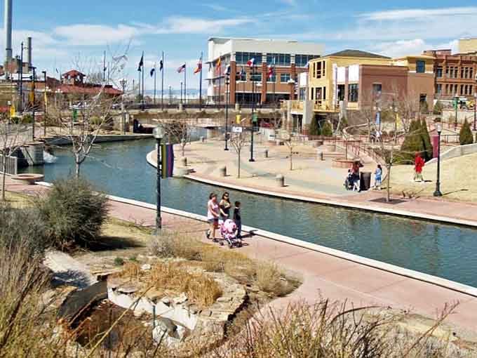 The Riverwalk winds through Pueblo's heart where families gather without spending a fortune on entertainment or parking fees combined.