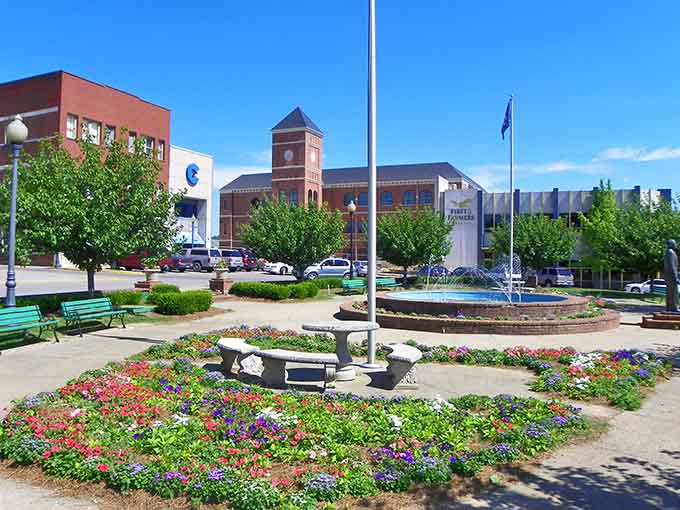 Flowers burst from the fountain plaza like confetti, transforming this public space into a garden party everyone's invited to.
