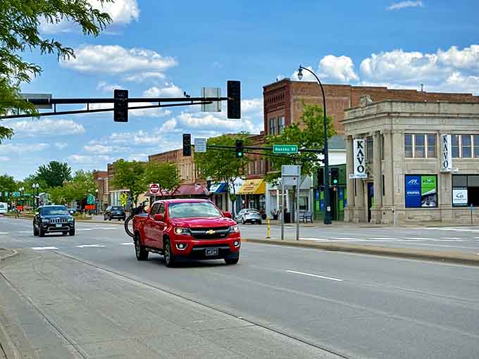 Wide streets, historic buildings, and summer greenery create the kind of scene that makes you want to slow down.