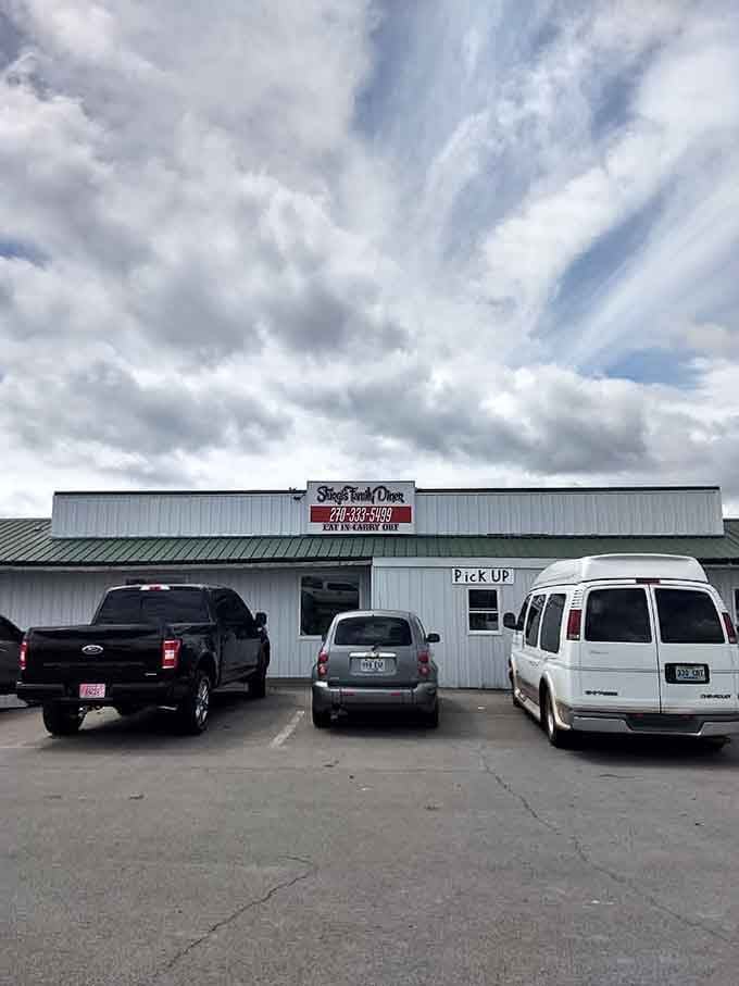 Dramatic clouds frame this unassuming building where the pickup window means you're never far from satisfaction.