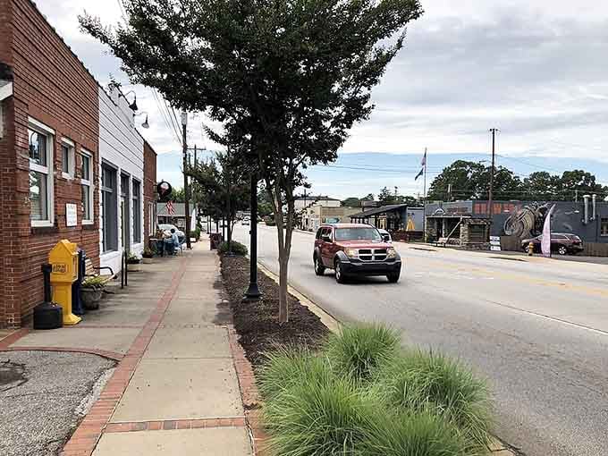 Brick sidewalks and shade trees create the kind of Main Street where Andy Griffith would've felt right at home.