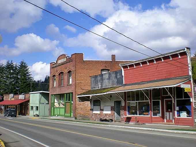 Weathered facades tell tales of boom times and quiet years, each brick holding memories like a scrapbook made of mortar.