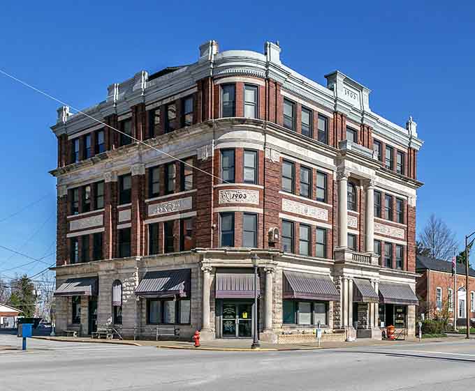 The grand facade with its balustrades and bay windows commands attention like a dowager duchess at a garden party.
