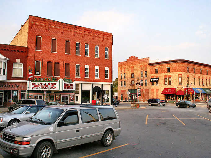 Golden hour bathes these brick storefronts in warm light, making every building look like it's ready for its closeup.