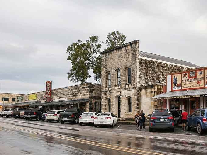 Rain-slicked streets and sturdy limestone buildings show this cowboy town looks good in any kind of weather.