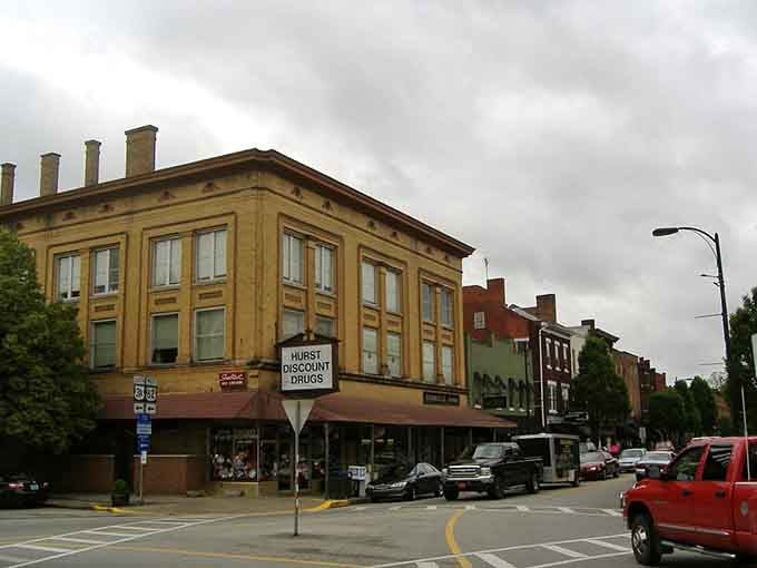 Overcast skies can't dim the golden glow of these vintage storefronts that have weathered every storm together.