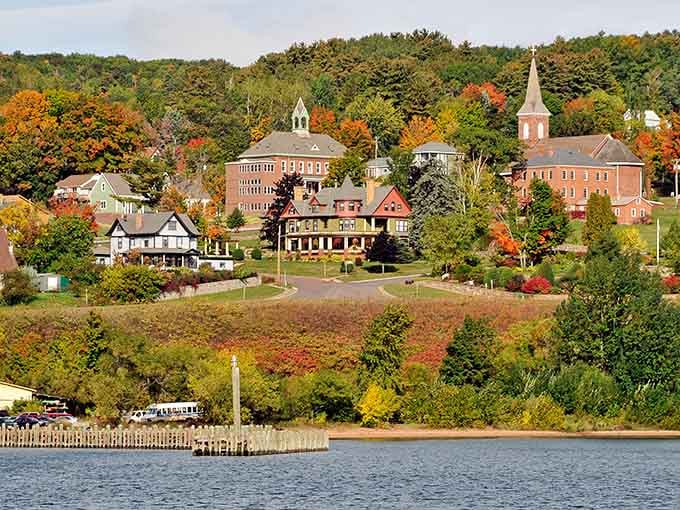 Autumn explodes across the hillside in orange and crimson, framing Bayfield like a masterpiece painted by nature itself.