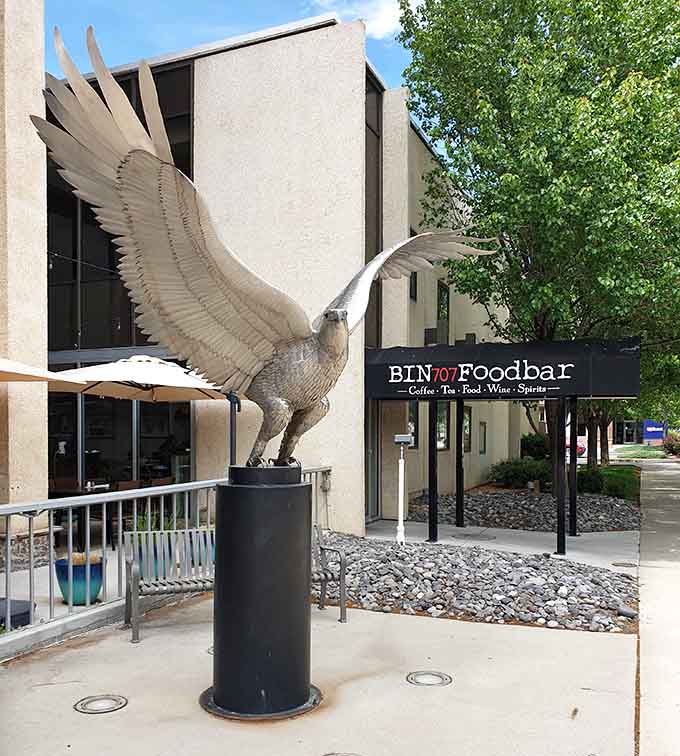 Modern art meets foodie paradise where the striking entrance sculpture hints at creative culinary experiences waiting inside.