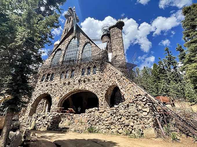 The intricate stonework and soaring towers prove that one person's dream can literally reach toward the sky, one rock at a time.