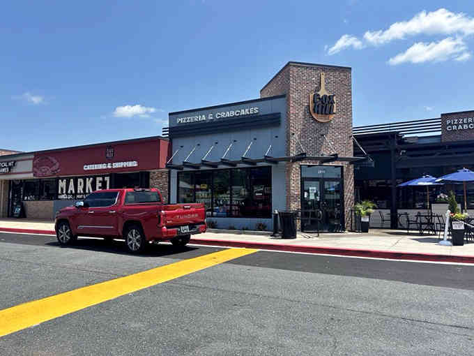 Brick, modern design, and prime location combine to create a neighborhood gem where pizza meets Maryland's finest seafood tradition.