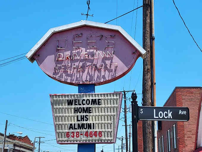 The classic marquee lettering welcomes locals and travelers alike to experience authentic drive-in tradition and flavor.
