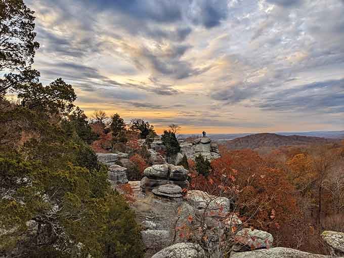 Golden hour transforms these ancient rocks into glowing monuments, while autumn colors spread across the valley like spilled paint.