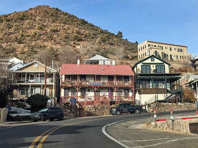 Historic buildings cling to the steep street, defying gravity with the determination of old-time miners.