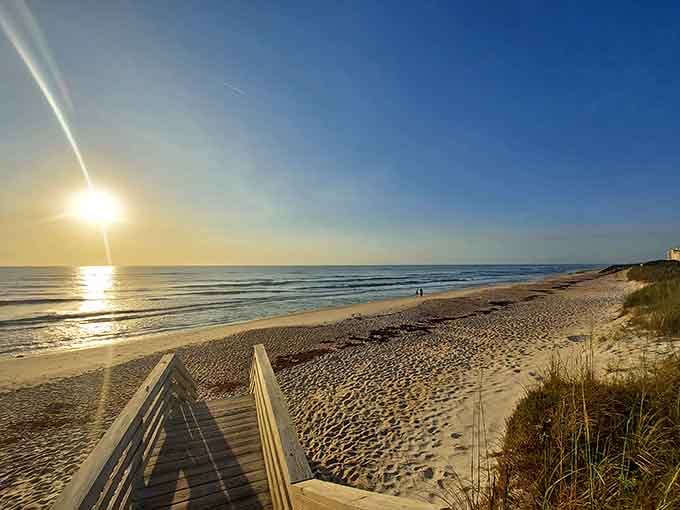 Golden hour transforms this quiet beach into a photographer's dream where sand meets sea perfectly.