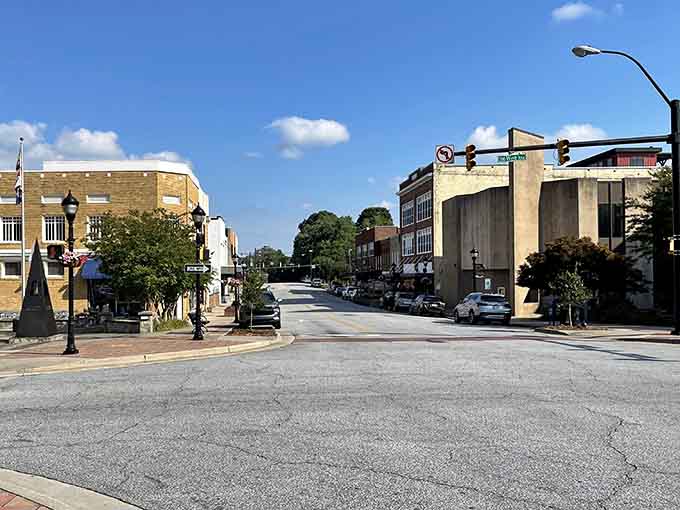 The open road ahead beckons explorers to discover local shops tucked inside these beautifully preserved downtown structures.