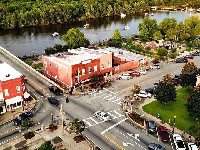 The waterfront location combines natural beauty with practical living, where boats dock and budgets breathe easier every single day.