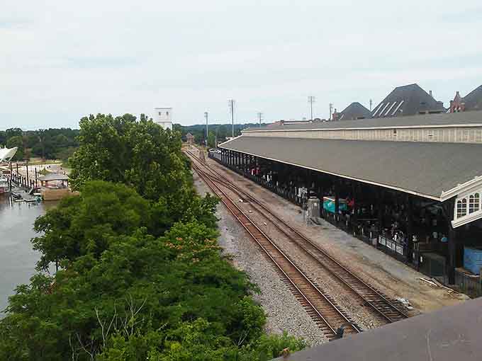The historic train shed in Montgomery stretches impressively along the waterfront, showcasing the city's important railroad heritage and engineering excellence.