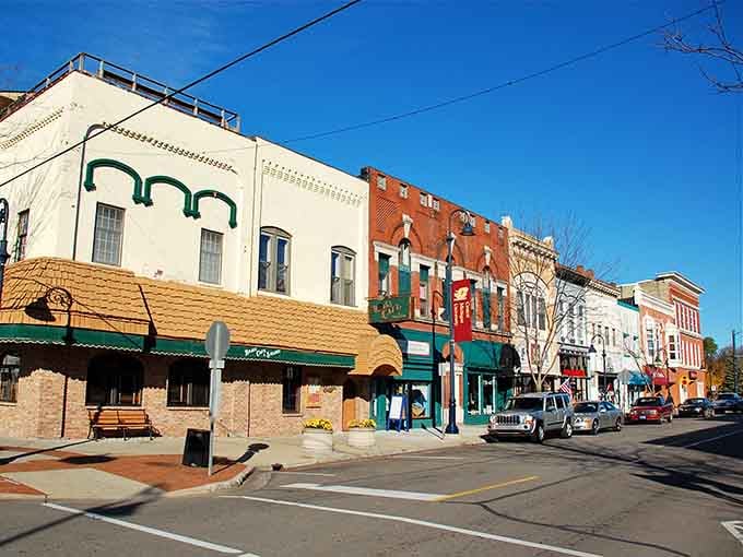 Those colorful storefronts line up like a box of crayons, proving college towns can be affordable and artsy.