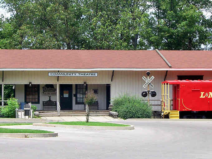 The bright red caboose parked beside the community theatre proves that small towns know how to make every corner interesting.