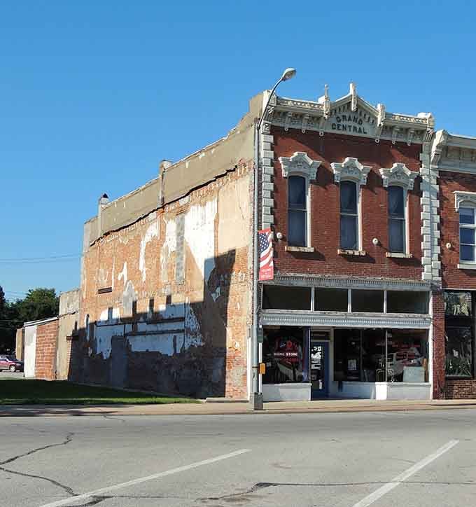 The weathered brick and faded paint create a nostalgic snapshot of America's heartland history and character.