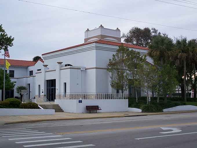 White stucco walls and red tile roofs showcase architectural elegance that makes even a simple building look like art.