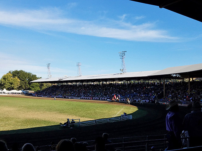 Afternoon shadows stretch across the rodeo grounds, where generations have gathered to celebrate Western heritage.
