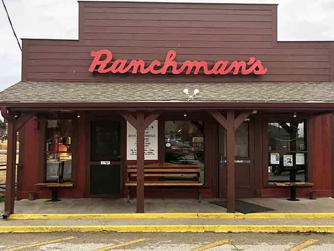 That covered porch with wooden benches invites you to sit a spell and enjoy hearty meals in true cowboy fashion.