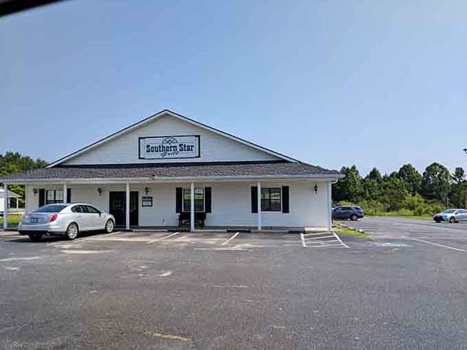 Clean white exterior and green shutters promise straightforward Southern cooking without pretense, just like grandma intended it.