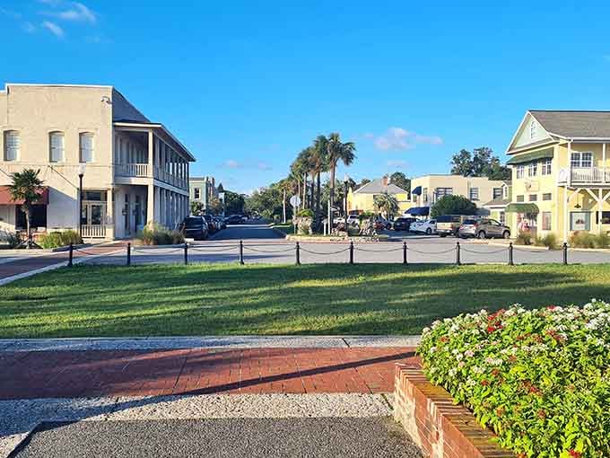 The brick walkways and manicured greenery show a community that takes pride in every corner of their charming downtown area.