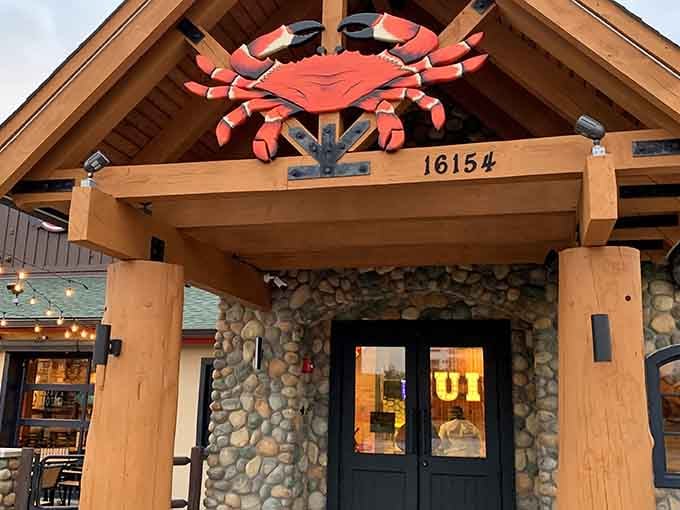 That magnificent coral-colored crab sculpture stands guard like a delicious sentry welcoming hungry travelers to feast.