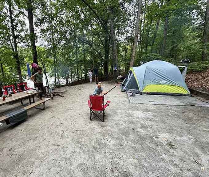 Tents pitched on sandy ground with the lake peeking through the trees &mdash; Twin Lakes proves that the best things really do cost very little.